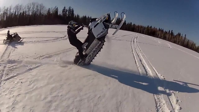 "Wheelie" stunt on snowmobile - Coub